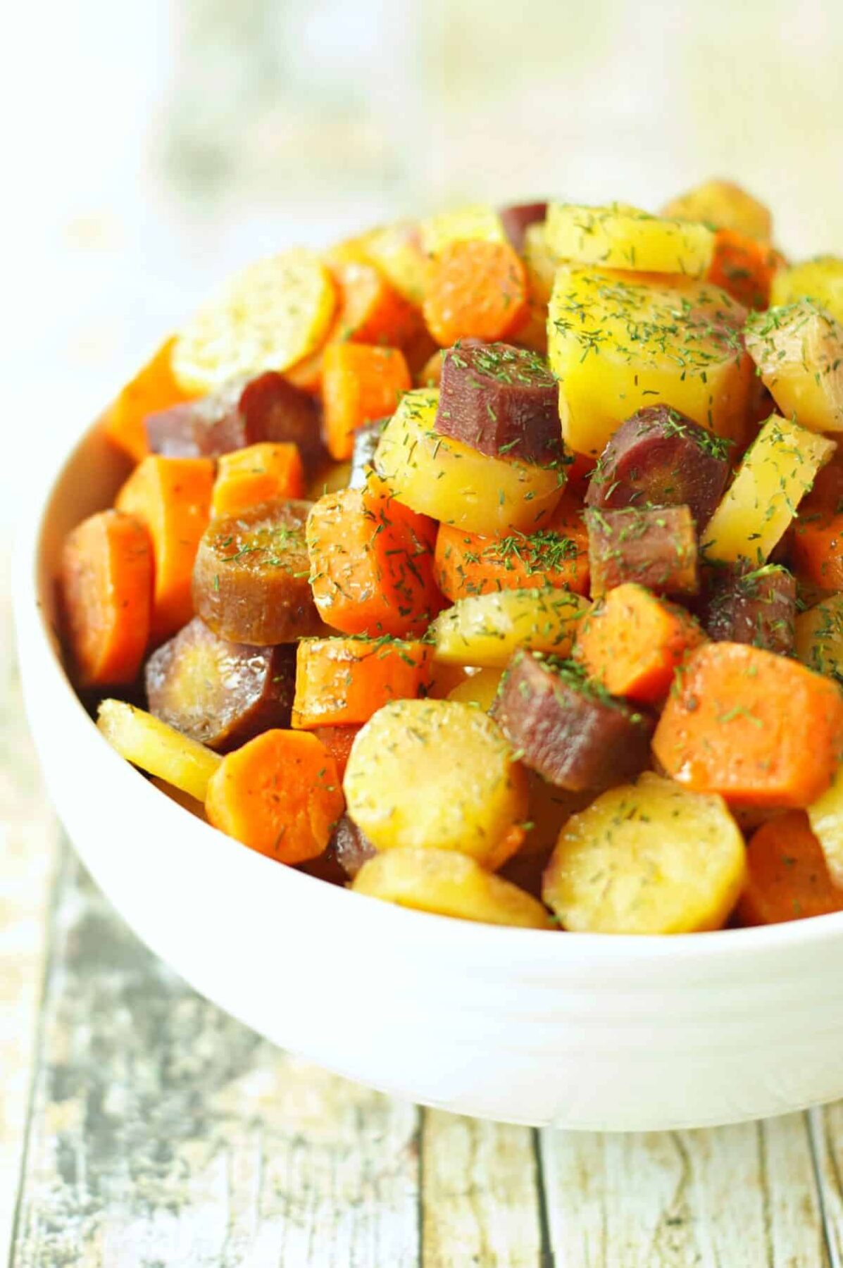 Slow Cooker Carrots with Herbed Honey Butter Sauce - Slow Cooker Gourmet